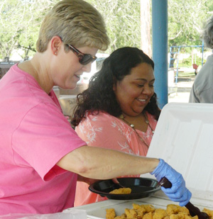 Church hooks oilfield workers with fish fry
