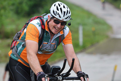 Cyclists weather storms to fight hunger