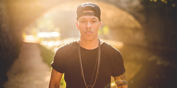 Rise up, rapper Trip Lee challenges students