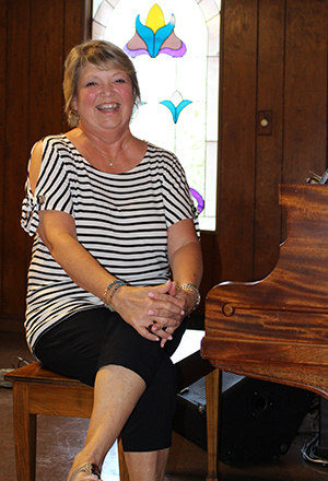 Church musician finds solace and strength in playing the piano