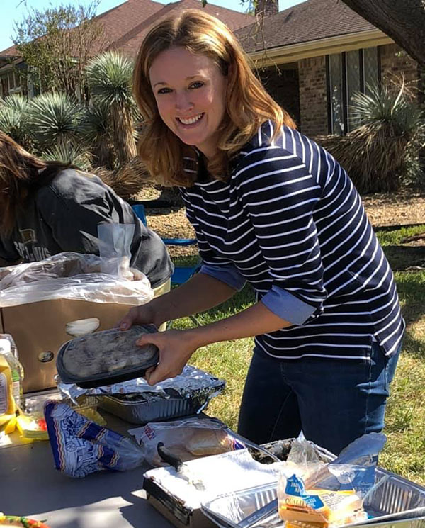 Church feeds hard-hit neighborhood from family's lawn